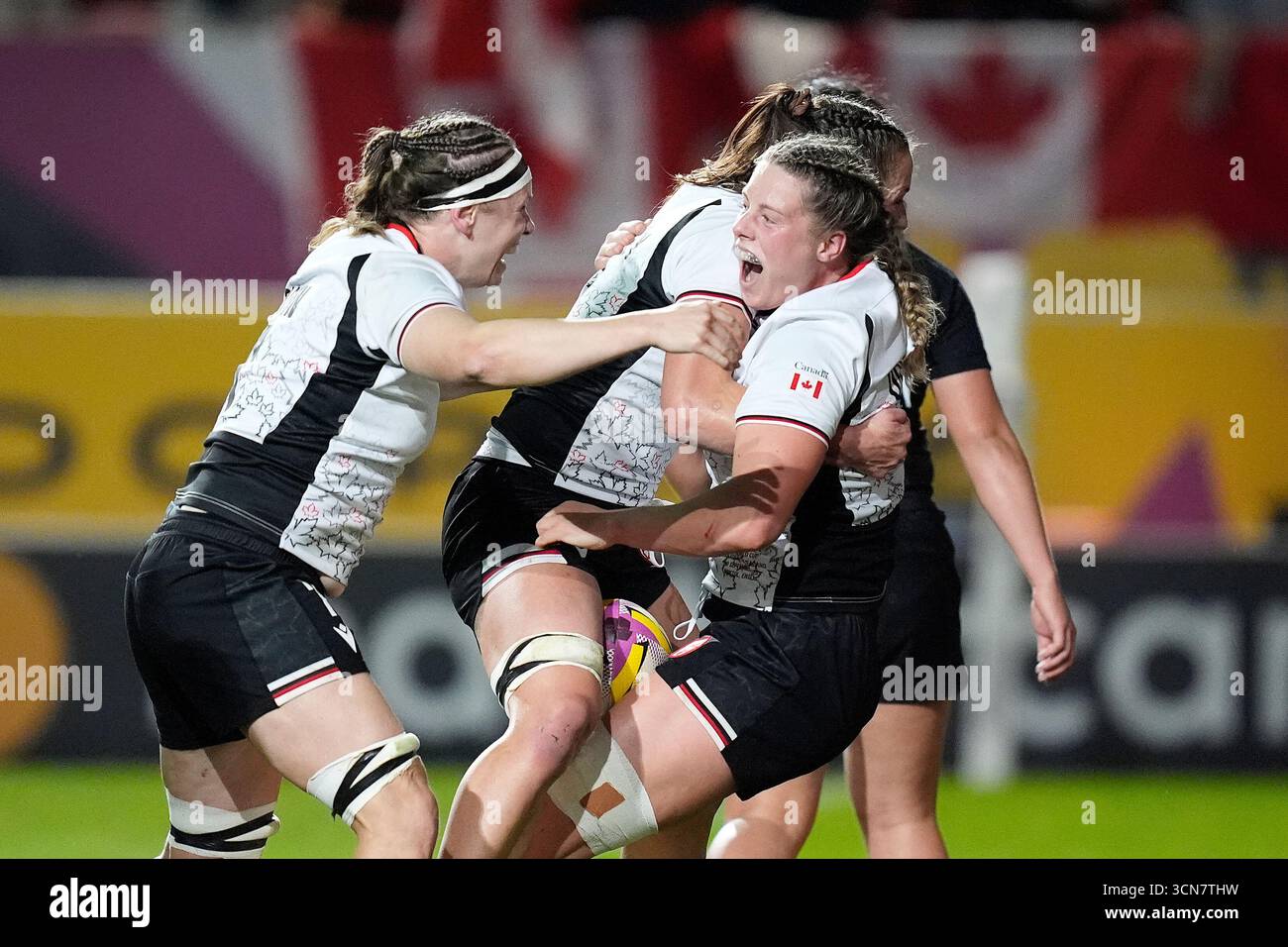 Canada's Sophie de Goede (right) celebrates with team-mates after ...