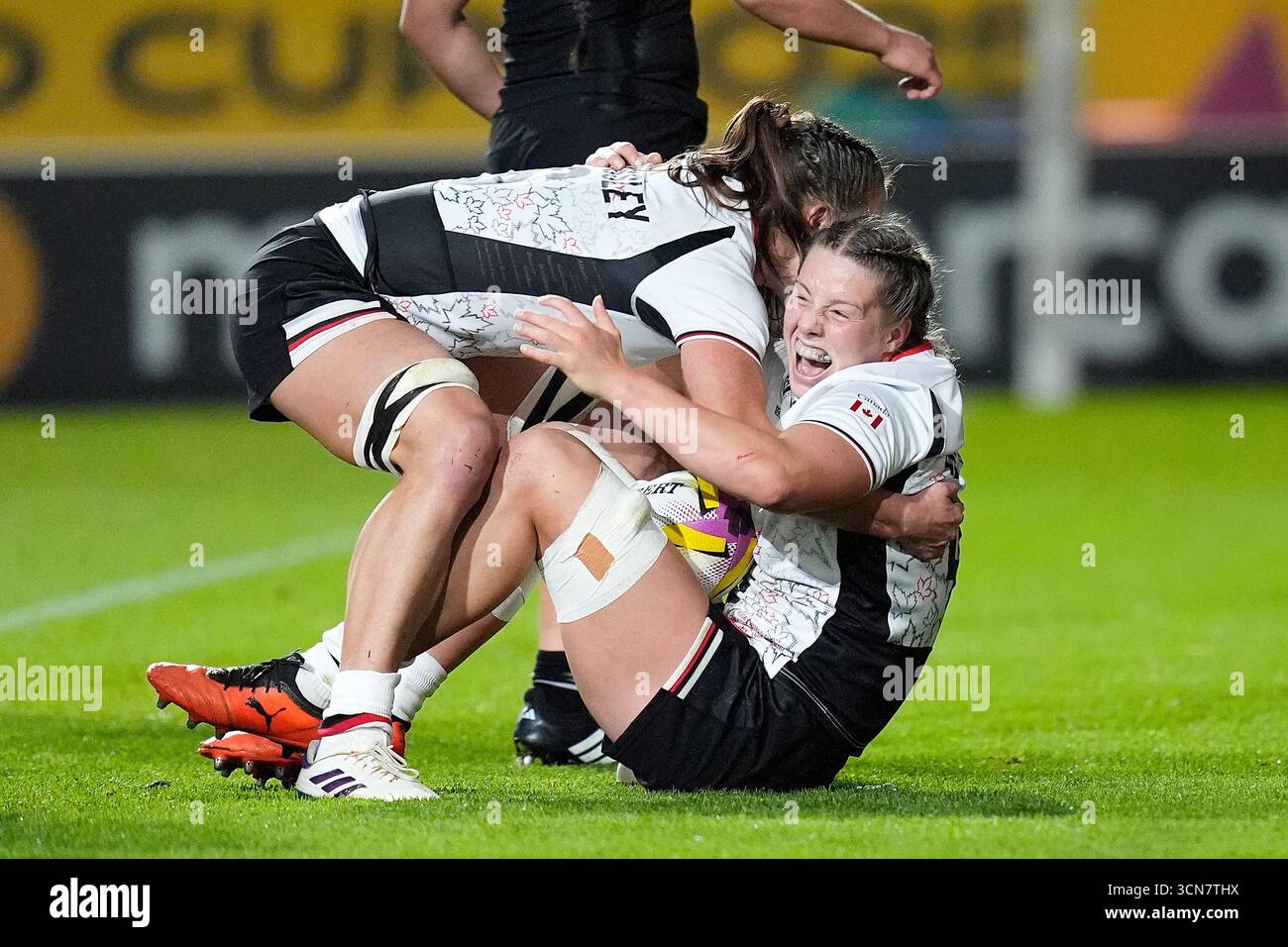 Canada's Sophie de Goede (right) celebrates with team-mates after ...