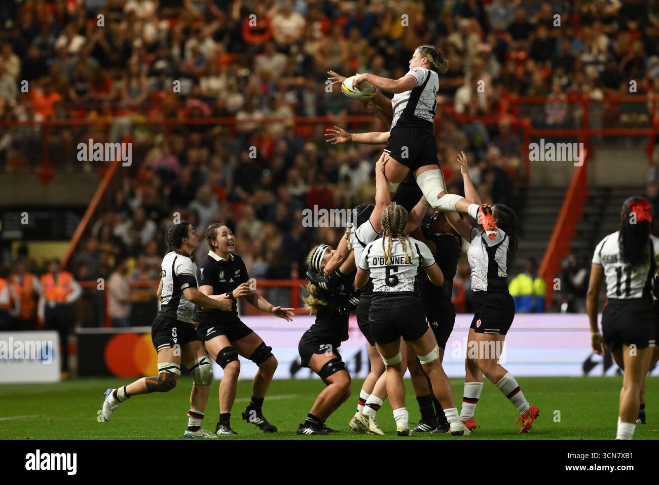 Canada's Sophie de Goede, top, challenges for the ball during the Women ...