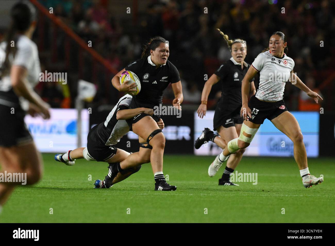 New Zealand's Kaipo Olsen-Baker, centre, and Canada's Fabiola Forteza ...