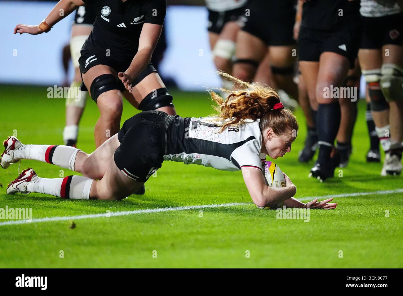 Canada's Alexandra Tessier scores a try during the Women's Rugby World ...