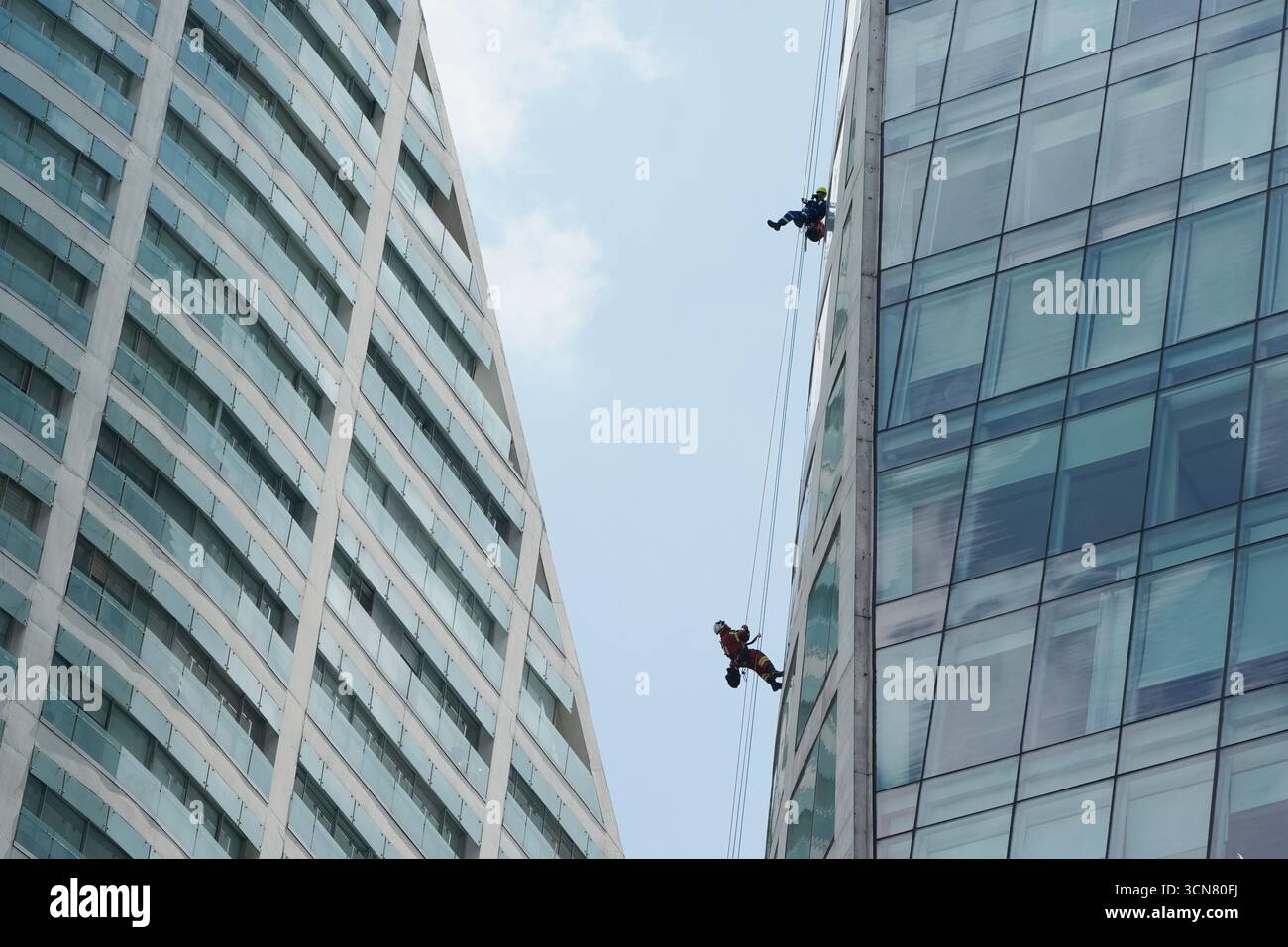 Rescue workers practice rappelling from a building in Mexico City ...