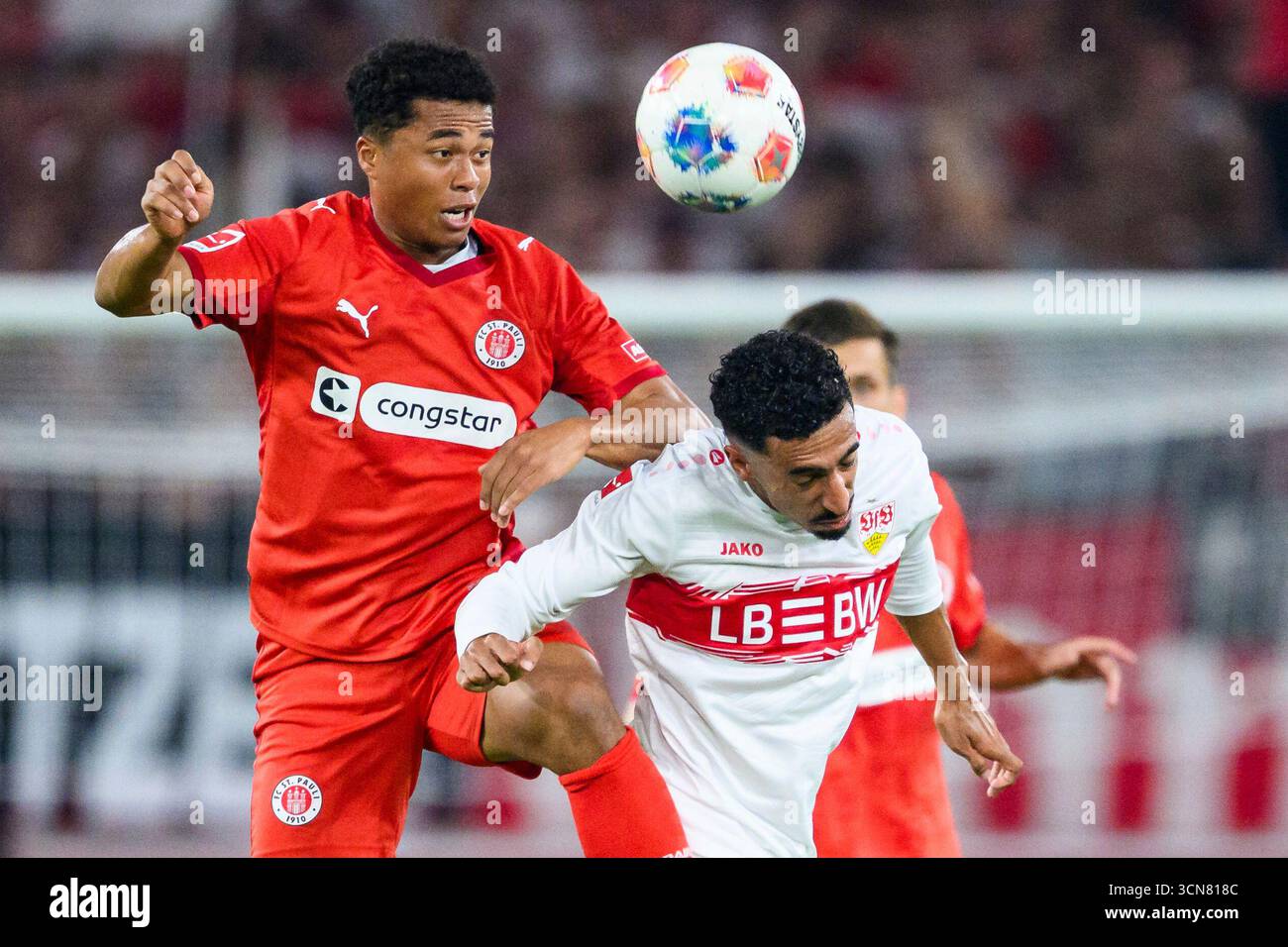 St. Pauli's Joel Chima Fujita, left, and Stuttgart's Tiago Tomás in ...