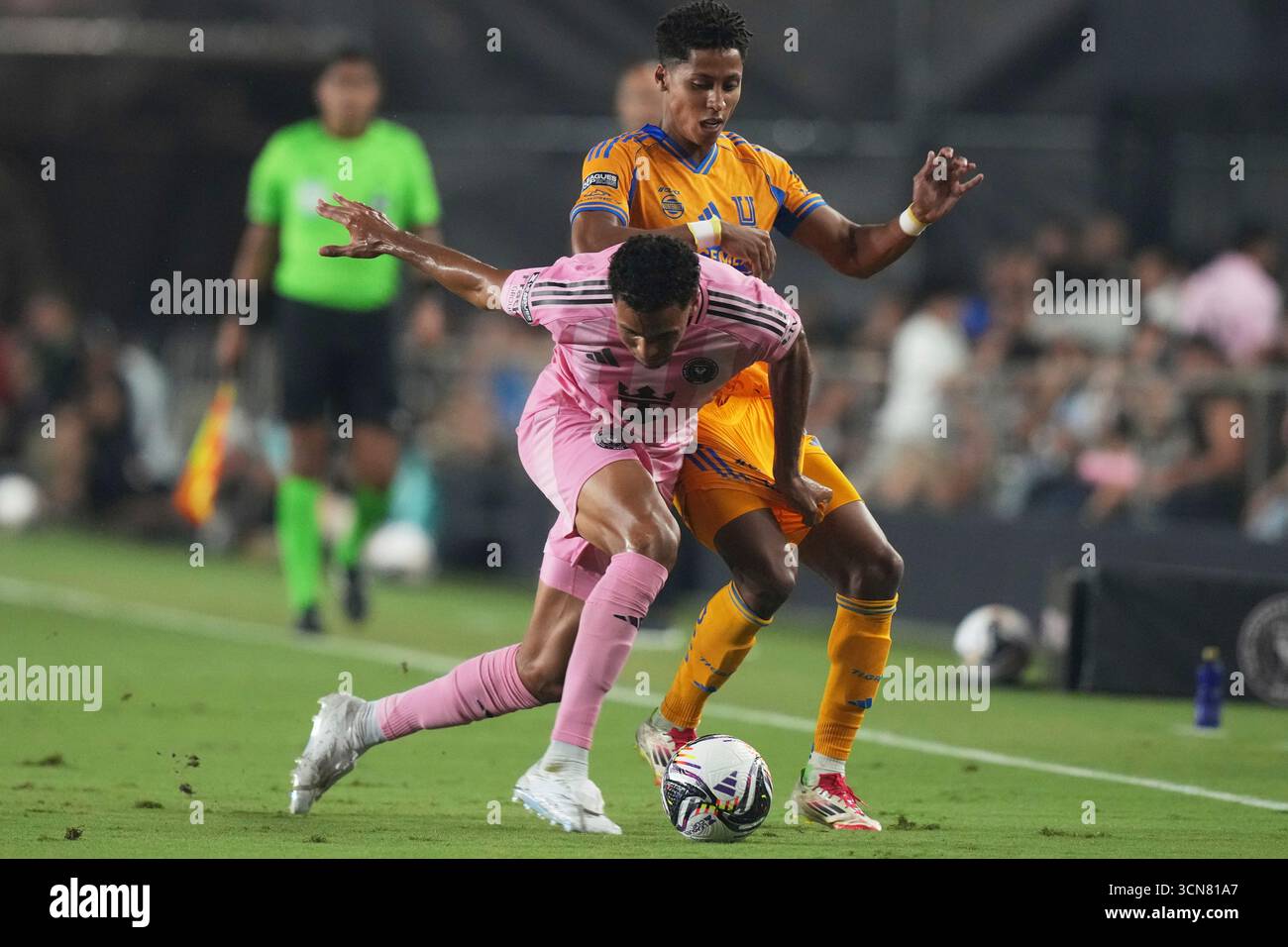 Inter Miami defender Ian Fray, left, and Tigres UANL forward Ozziel ...