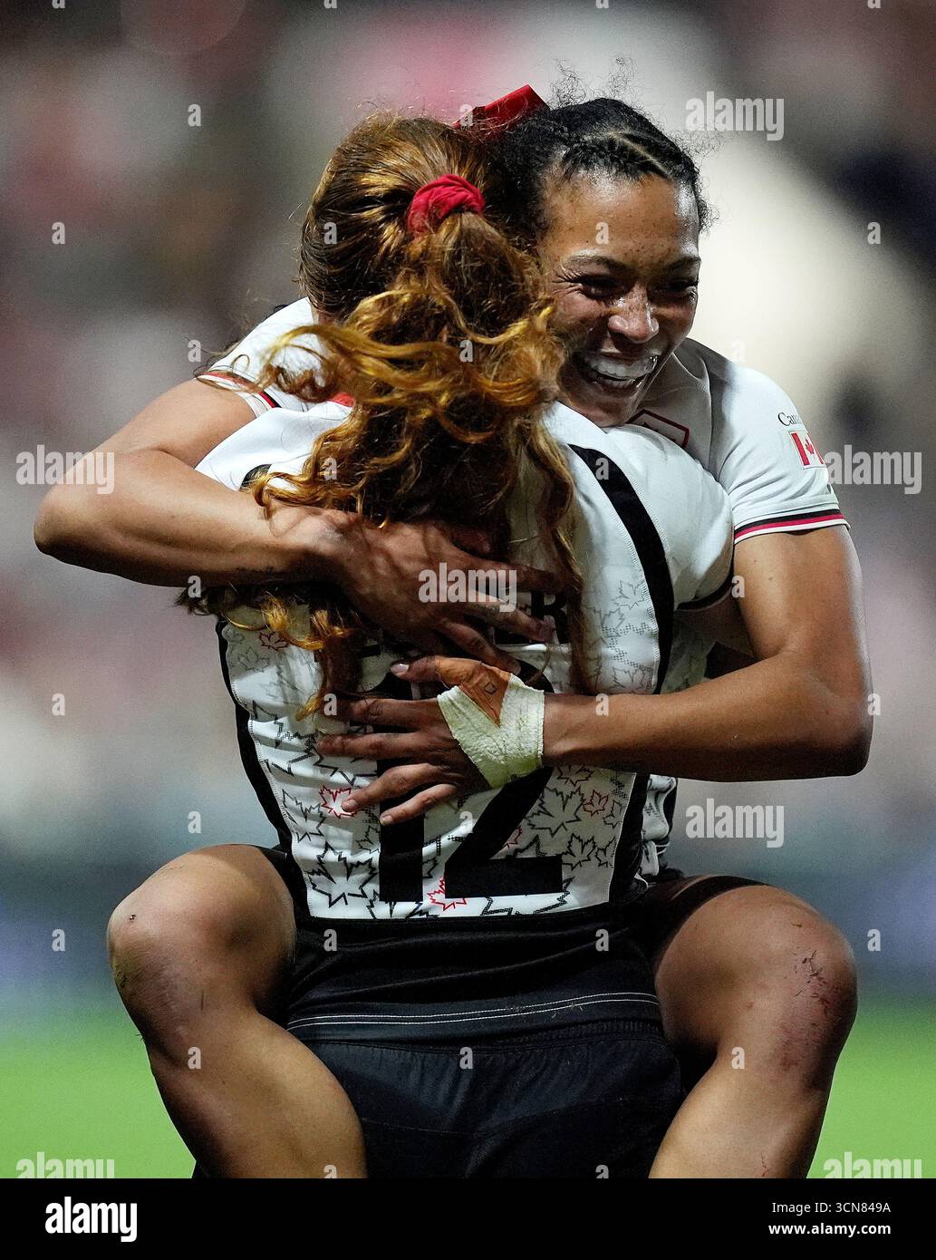 Canada's Asia Hogan-Rochester (right) and Alexandra Tessier celebrate ...