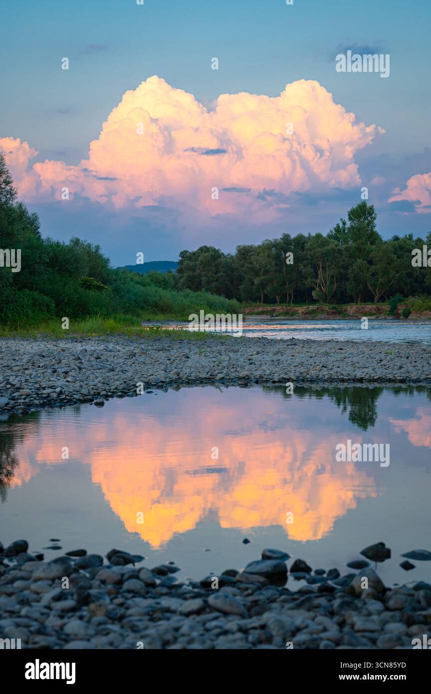 Tranquil riverside of river Mures in Transylvania, Romania featuring a ...
