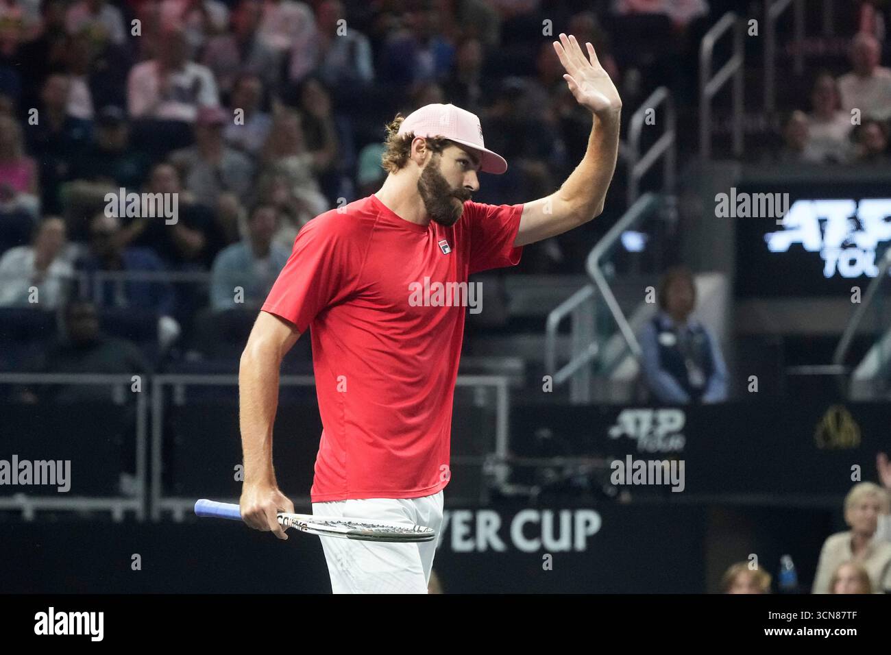 Team World's Reilly Opelka, of the United States, reacts after winning ...