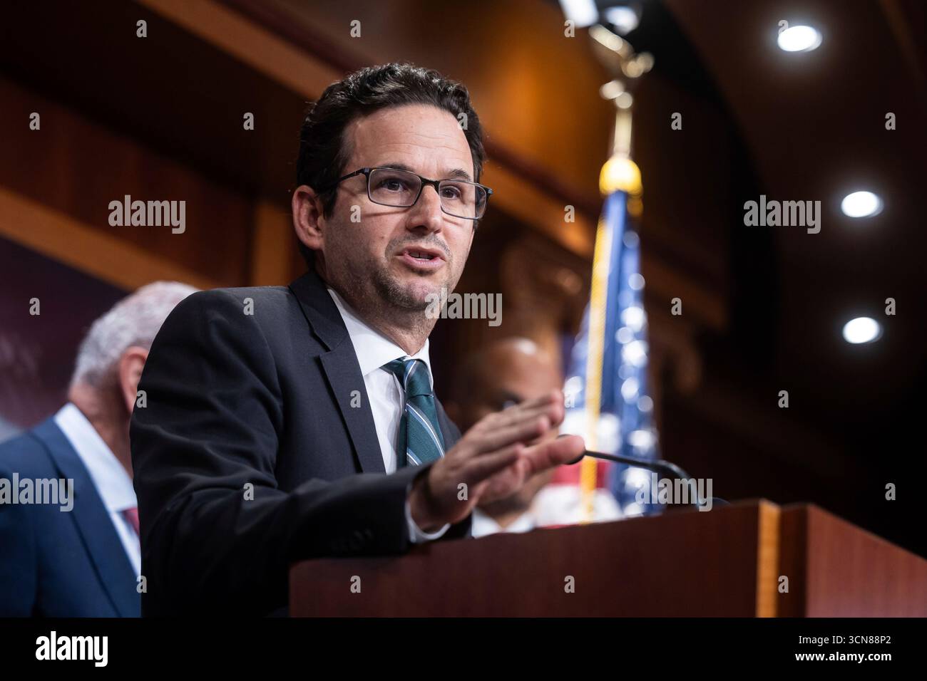 Sen. Brian Schatz (D-Hawaii) speaks during a press conference after the ...