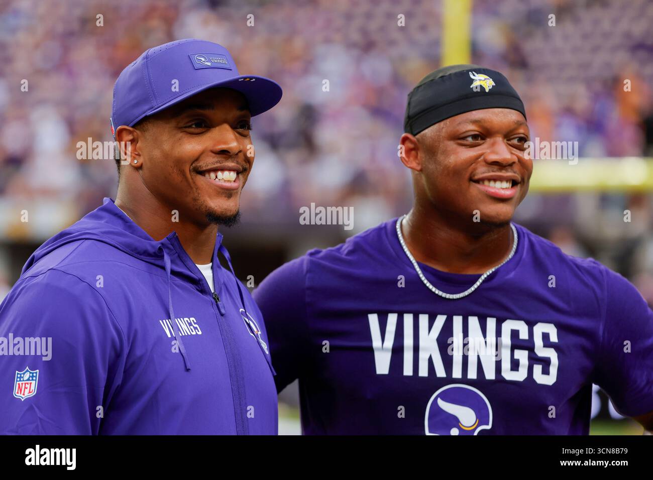 Minnesota Vikings fullback C.J. Ham, left, prepares with linebacker ...