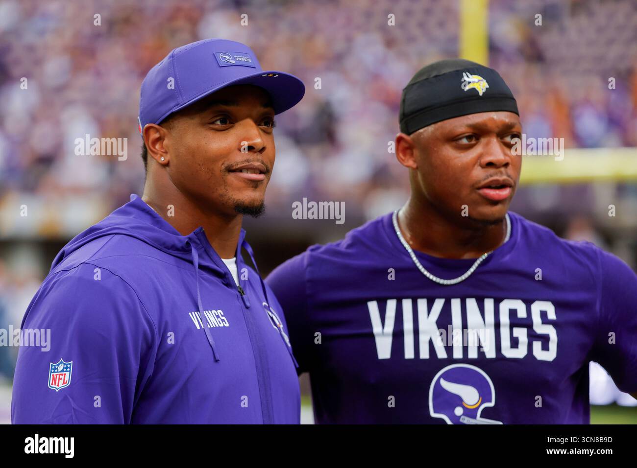 Minnesota Vikings fullback C.J. Ham, left, prepares with linebacker ...