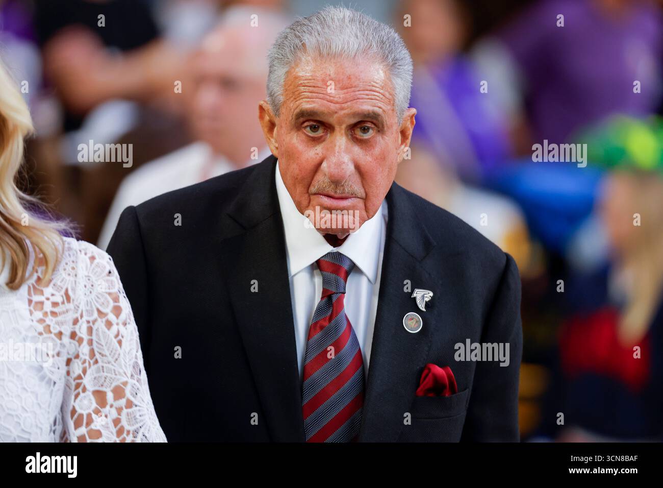 Atlanta Falcons owner Arthur Blank walks onto the field before an NFL ...