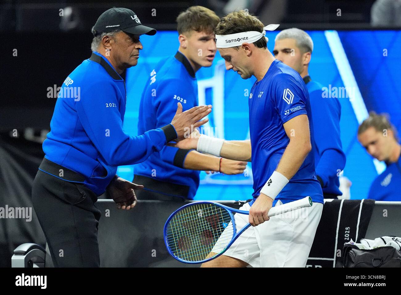 Team Europe captain Yannick Noah, left, congratulates Casper Ruud, of ...