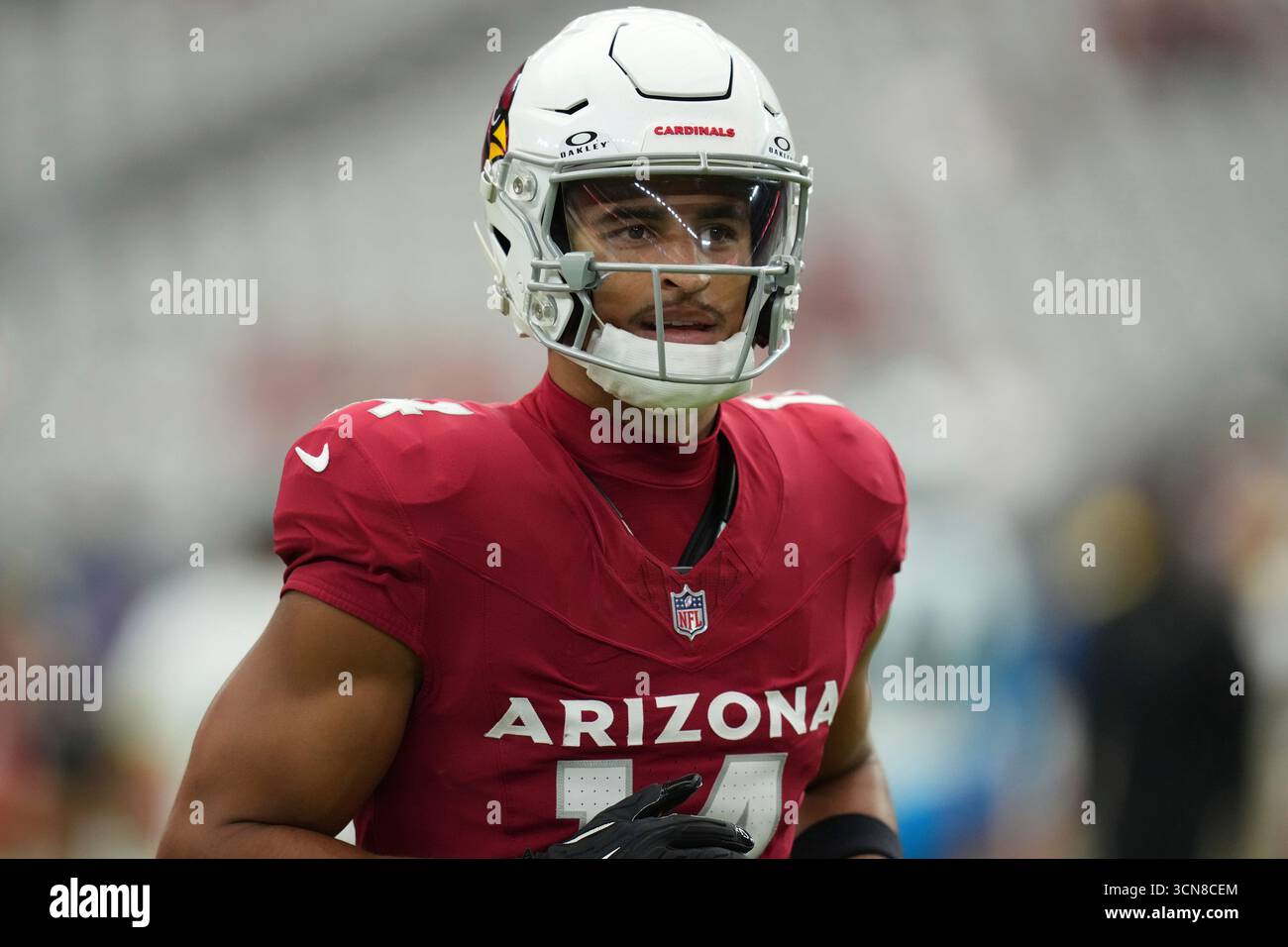 Arizona Cardinals wide receiver Michael Wilson (14) warms up before an ...