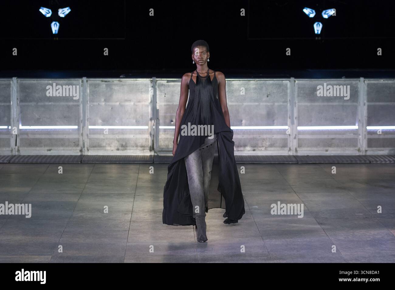 London, UK. 19th September, 2025. A model walks the runway during Mark ...