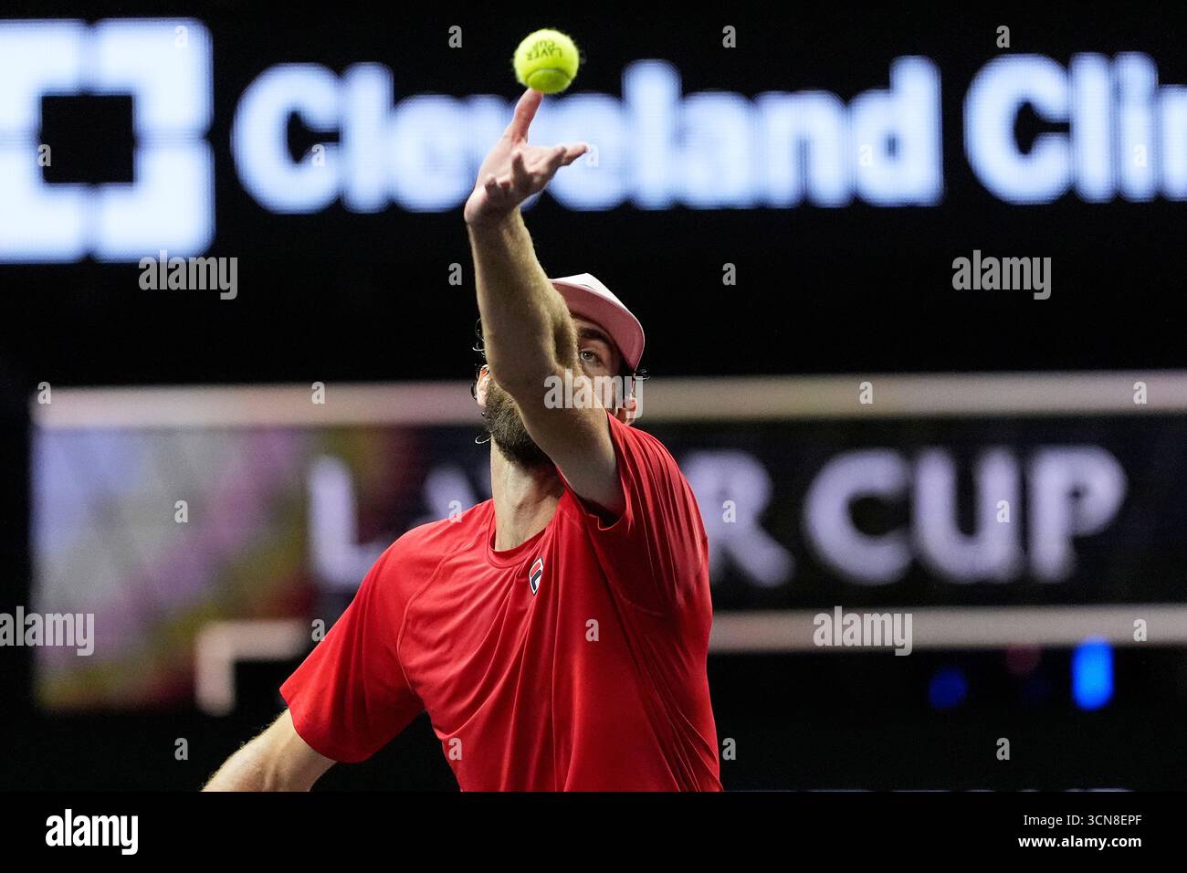Team World's Reilly Opelka, of the United States, serves against Team ...