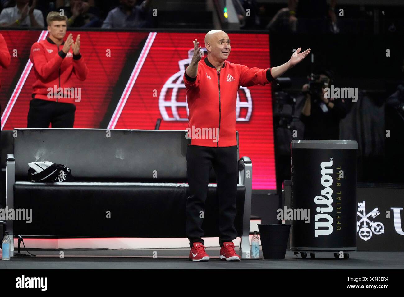 Team World captain Andre Agassi reacts after Reilly Opelka, of the ...