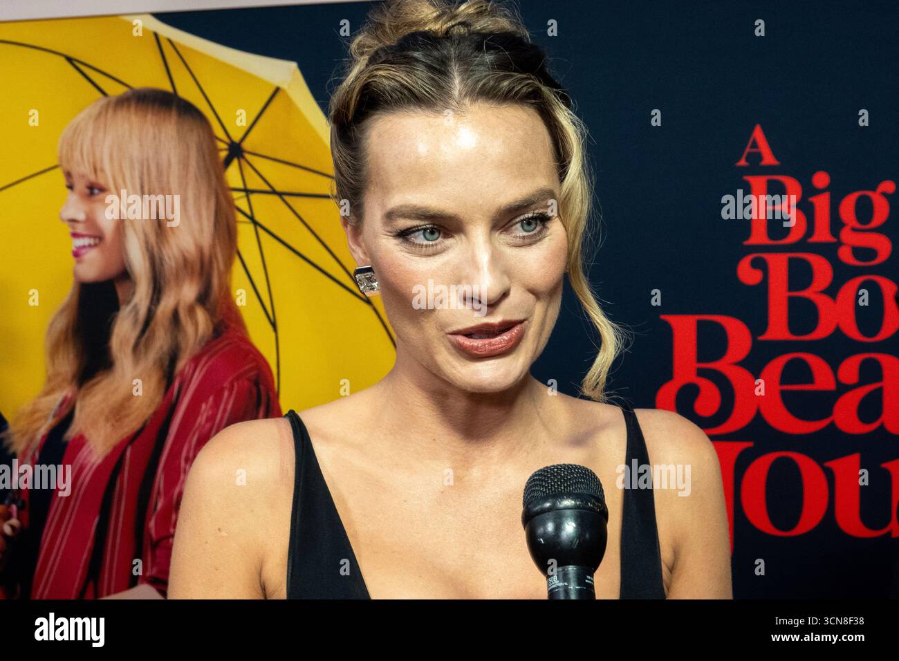 Margot Robbie speaks with the media at the Sony Pictures premiere of "A ...