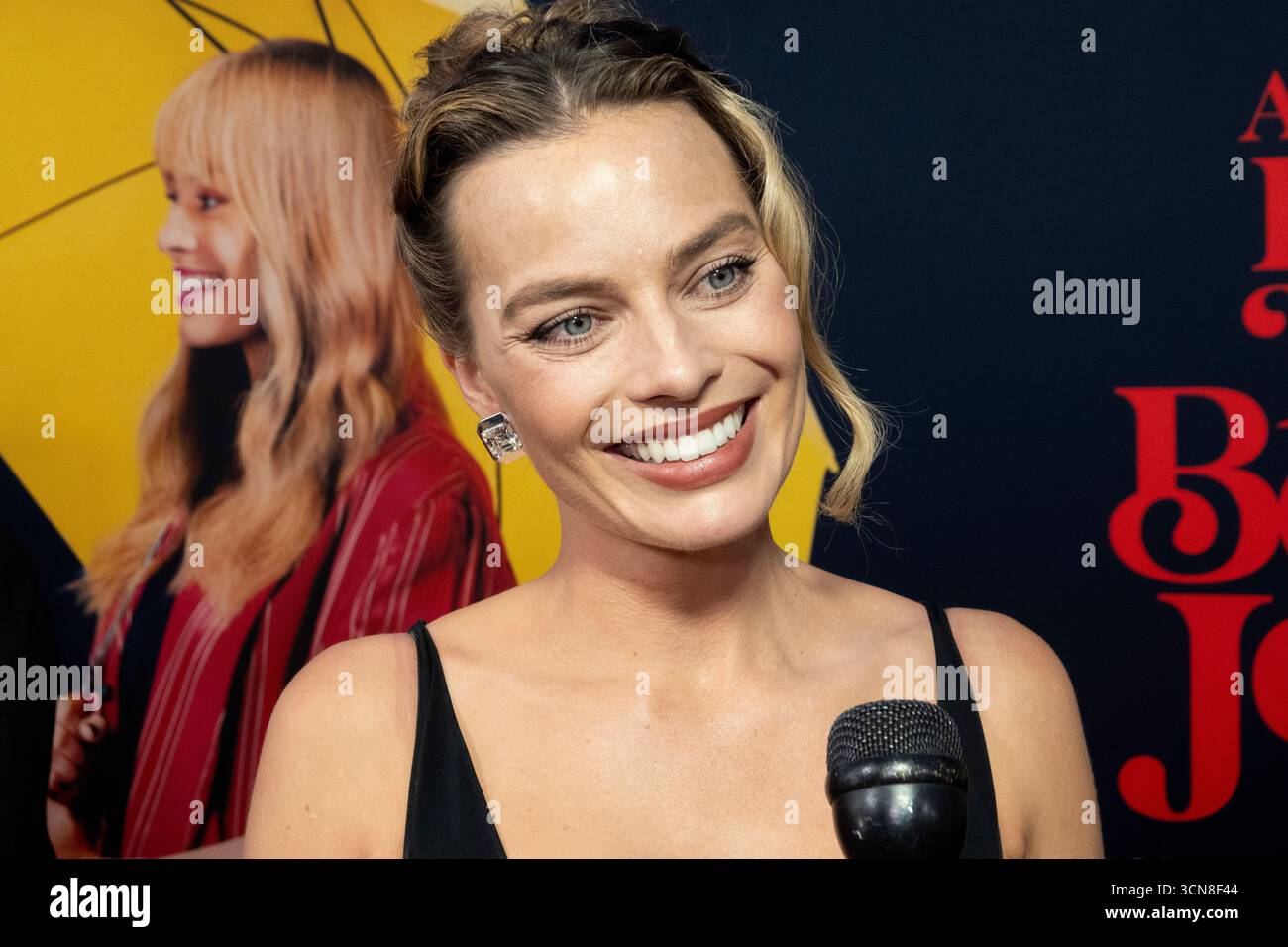 Margot Robbie speaks with the media at the Sony Pictures premiere of "A ...
