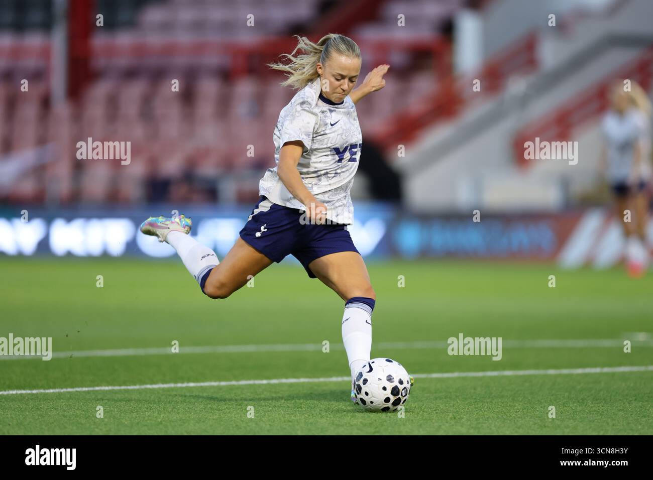 Olivia Holdt, of Tottenham Hotspurs Women, warming up before the match ...