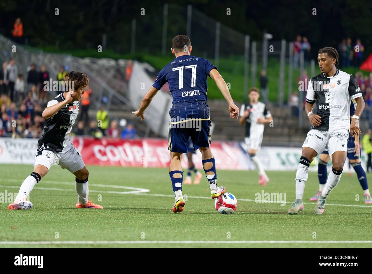 Tiago Escorza (77 Etoile Carouge FC) controls the ball (action) under ...