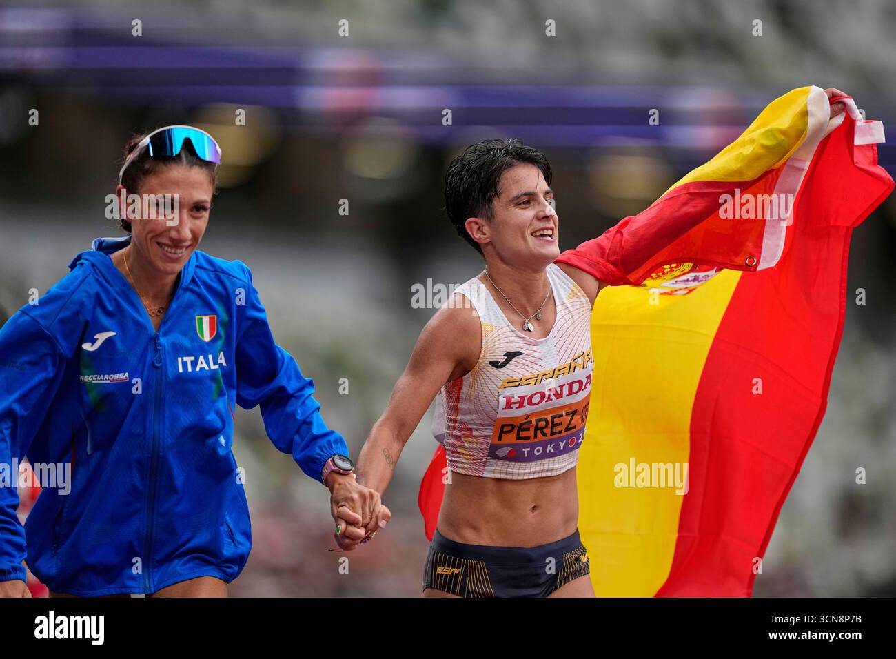 Spain's Maria Perez celebrates with Italy's Antonella Palmisano after ...