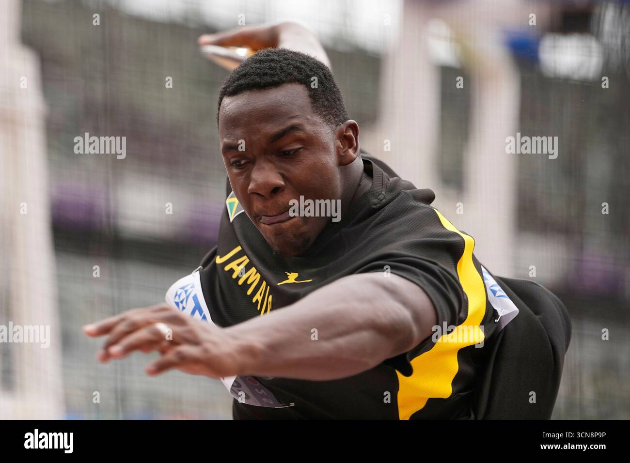 Jamaica's Ralford Mullings competes in the men's discus throw ...