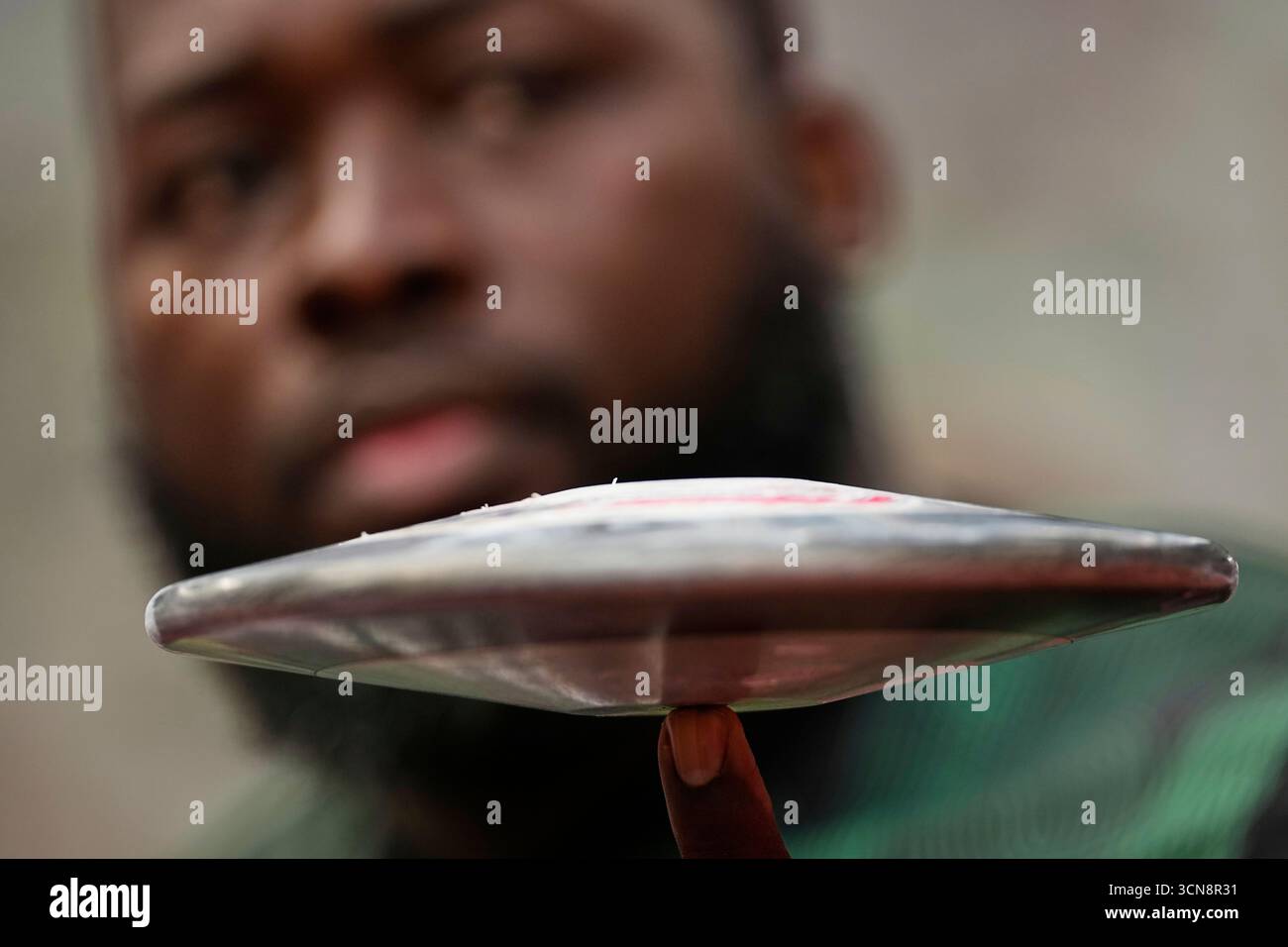 Jamaica's Chad Wright prepares to compete in the men's discus throw ...
