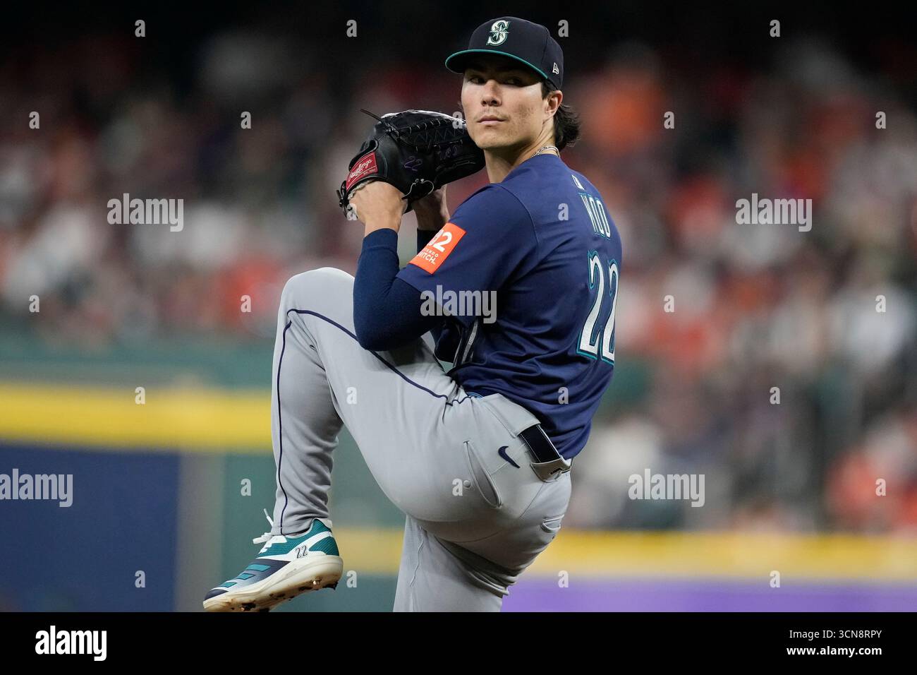 Seattle Mariners pitcher Bryan Woo (22) pitches during the first inning ...