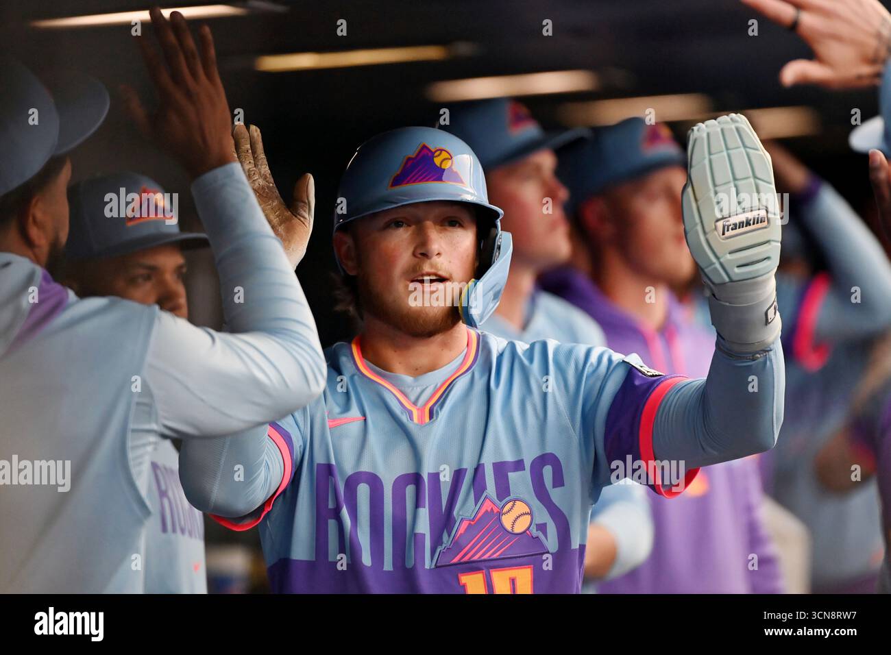 Colorado Rockies' Hunter Goodman (15) celebrates with teammates in the ...
