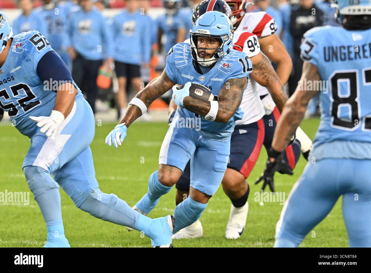 Toronto Argonauts wide receiver Kevin Mital (10) runs through a gap ...