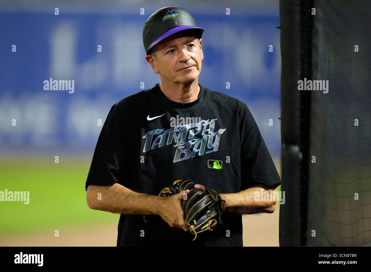 Tampa Bay Rays owner Stuart Sternberg works as a ball boy during the ...