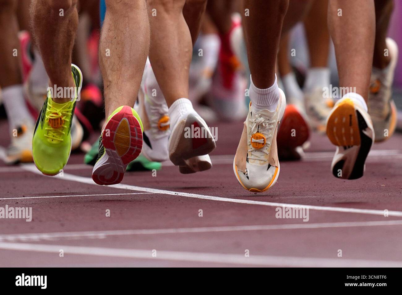 Athletes start the men's 20 kilometers race walk at the World Athletics ...