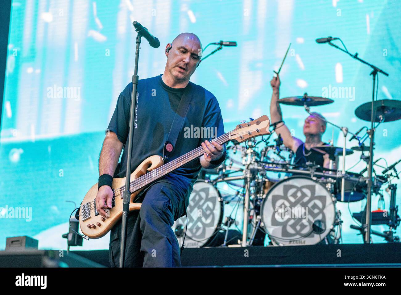 Aaron Bruch, left and James Cassells of Breaking Benjamin perform ...
