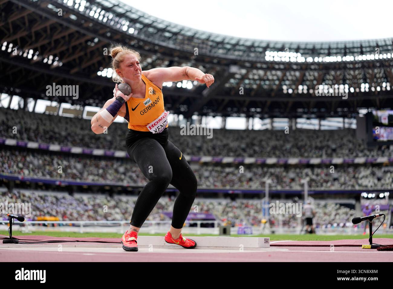 Germany's Alina Kenzel makes an attempt in the women's shot put ...