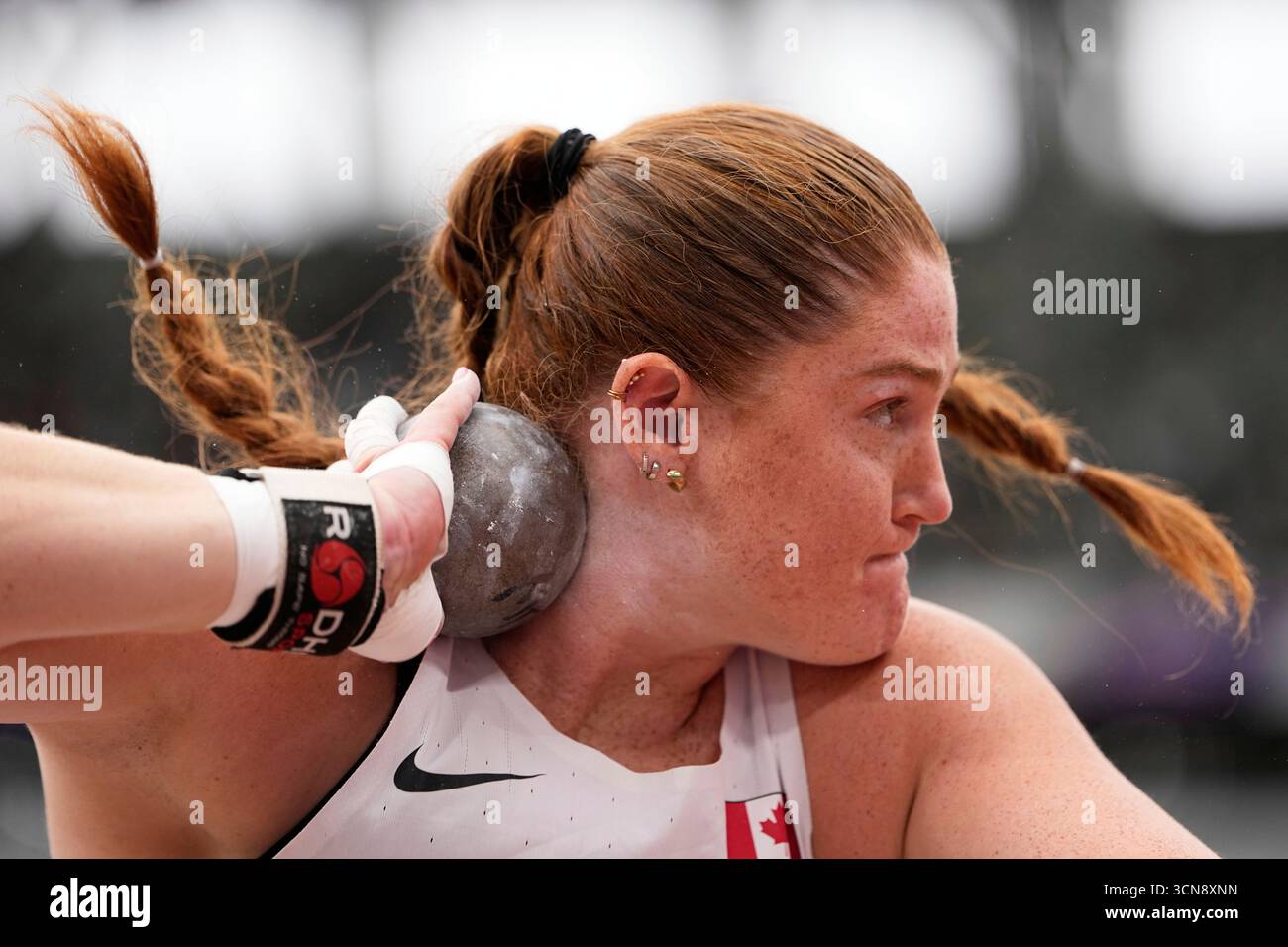 Canada's Sarah Mitton competes in the women's shot put qualification at ...