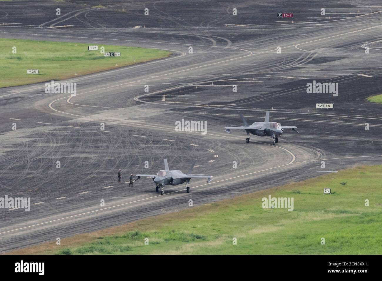 U.S. F-35 fighter jets taxi on the runway at Jose Aponte de la Torre ...