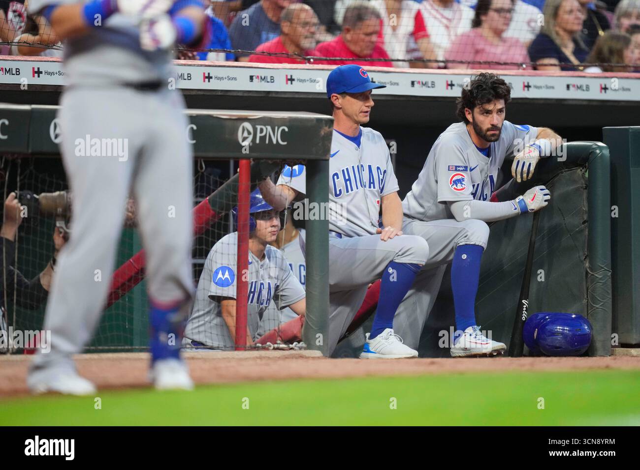 Chicago Cubs' Dansby Swanson, right, speaks with manager Craig Counsell ...