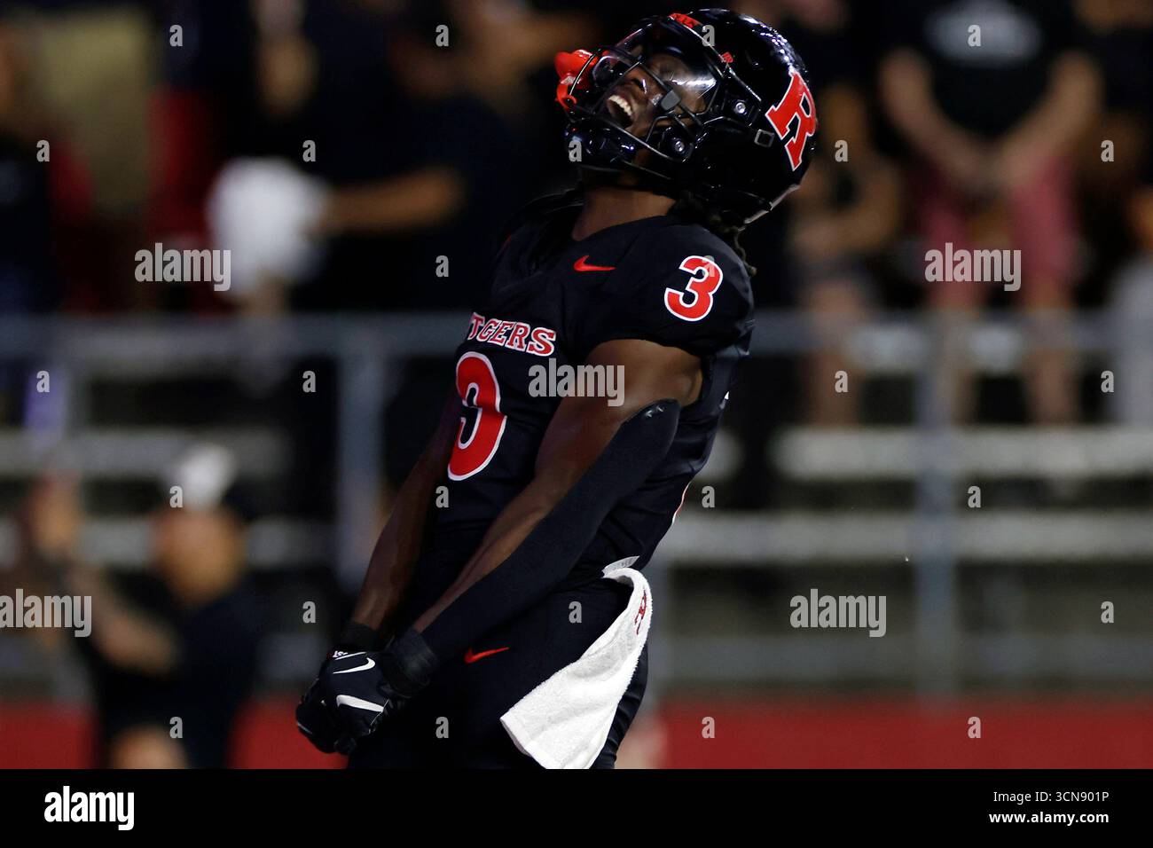 Rutgers running back Antwan Raymond (3) reacts after scoring a ...