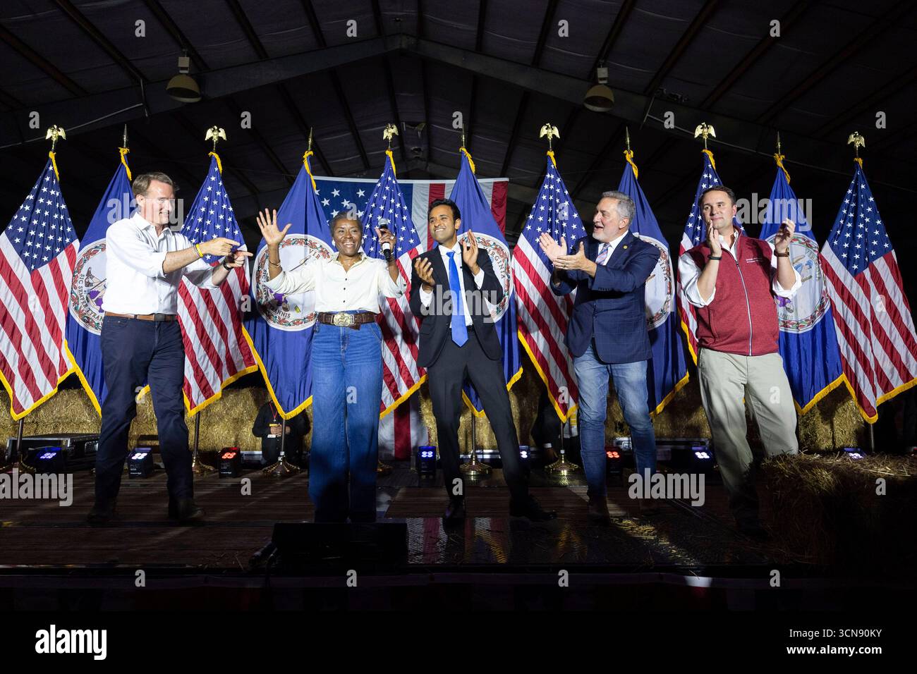 From left, Virginia Gov. Glenn Youngkin, gubernatorial candidate ...