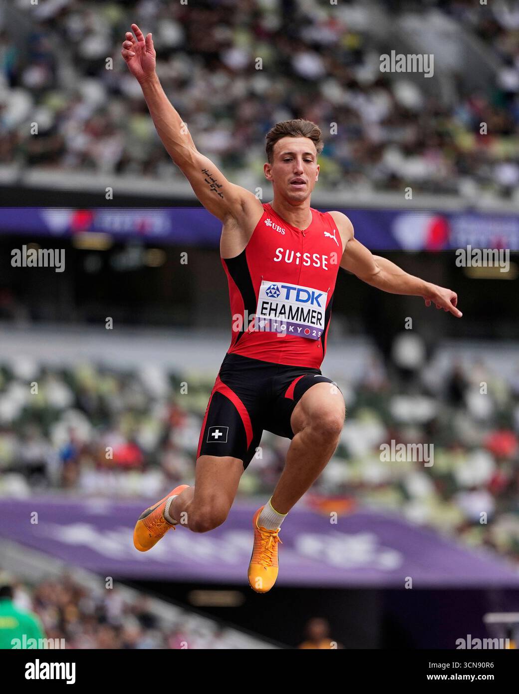 Switzerland's Simon Ehammer competes in the decathlon long jump at the ...
