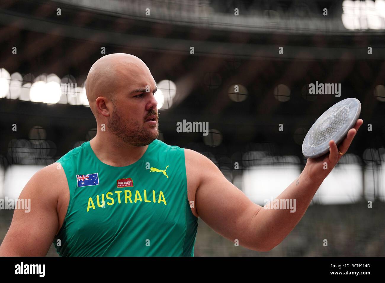 Australia's Matthew Denny makes an attempt in the men's discus throw ...