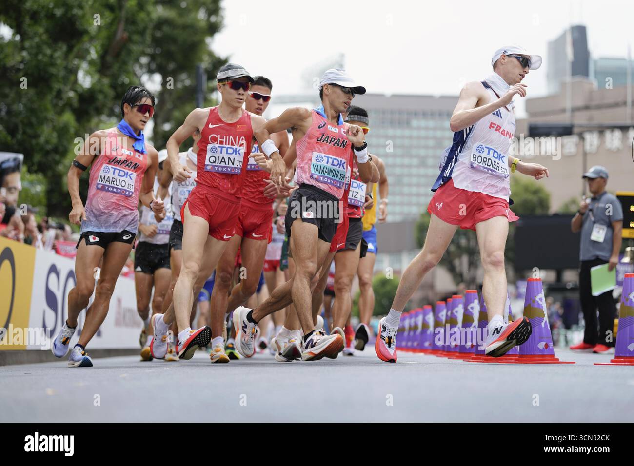Athletes compete in the men's 20-kilometer race walk at the World ...