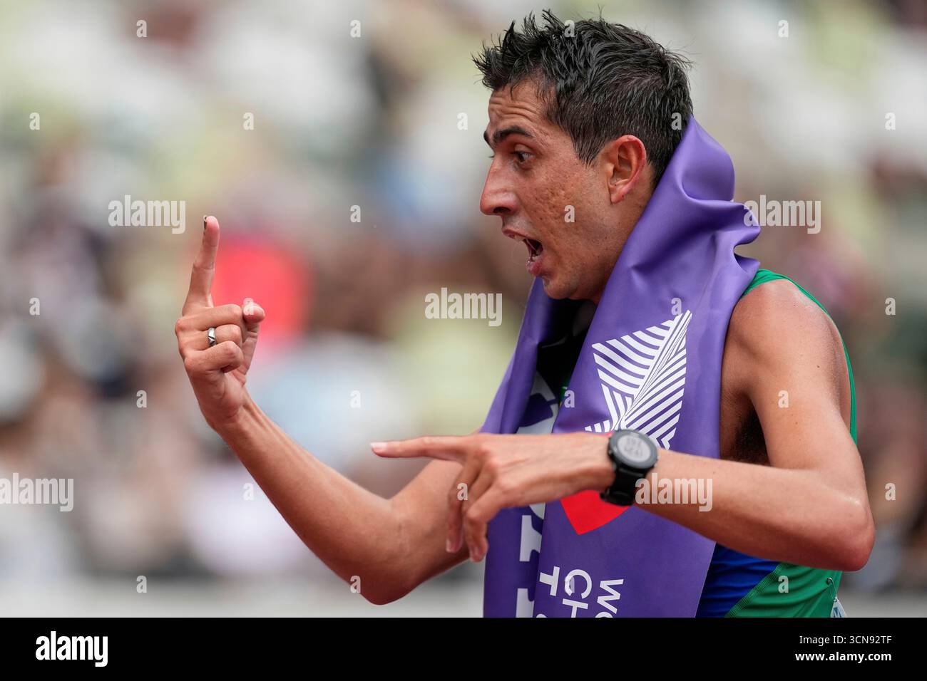Brazil's Caio Bonfim reacts after winning the men's 20 kilometers race ...