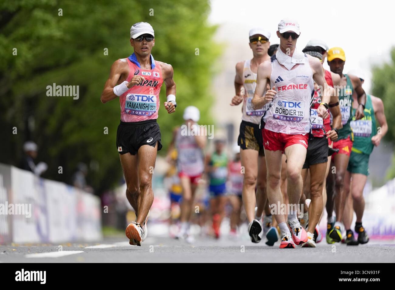 Athletes compete in the men's 20-kilometer race walk at the World ...