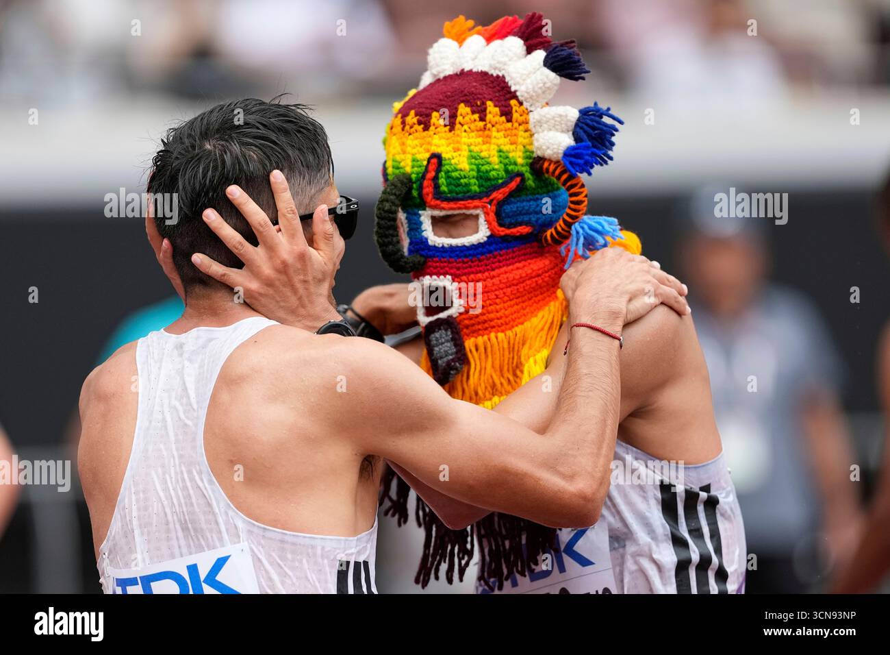 Ecuador's David Hurtado, right, embraces compatriot Jordy Rafael ...