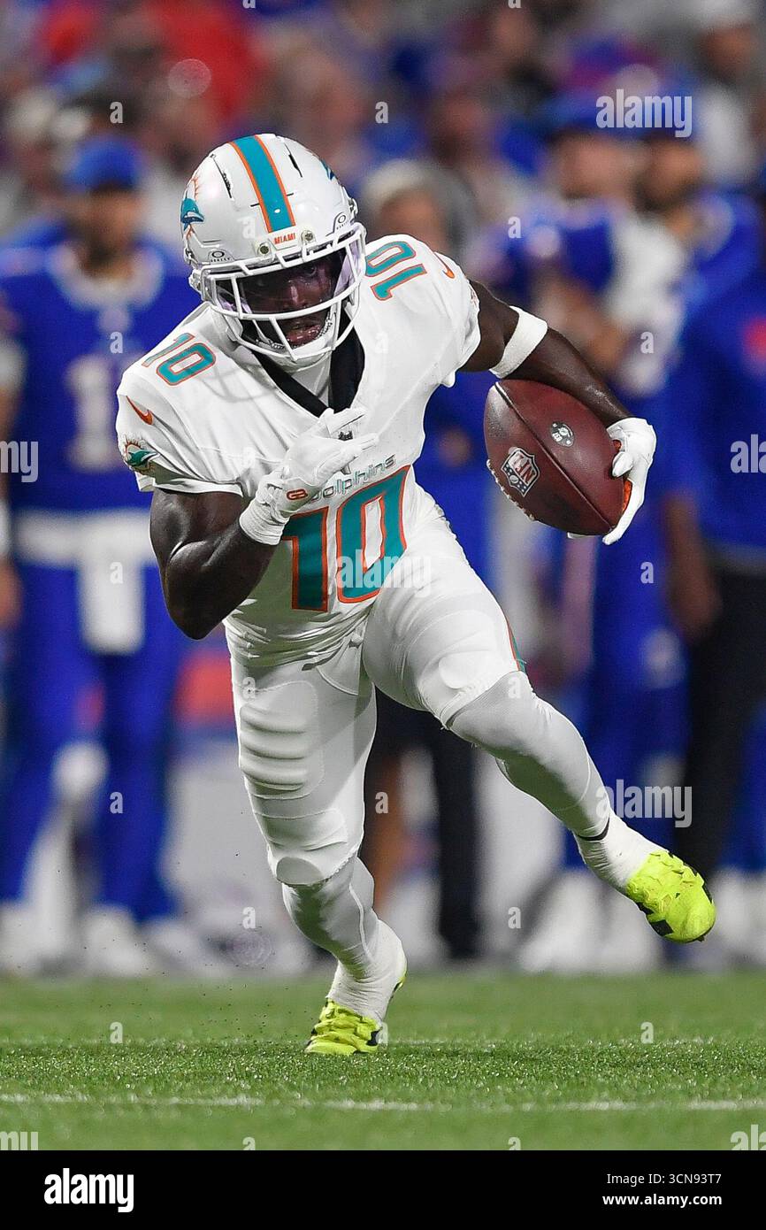 Miami Dolphins wide receiver Tyreek Hill (10) runs with the ball during ...