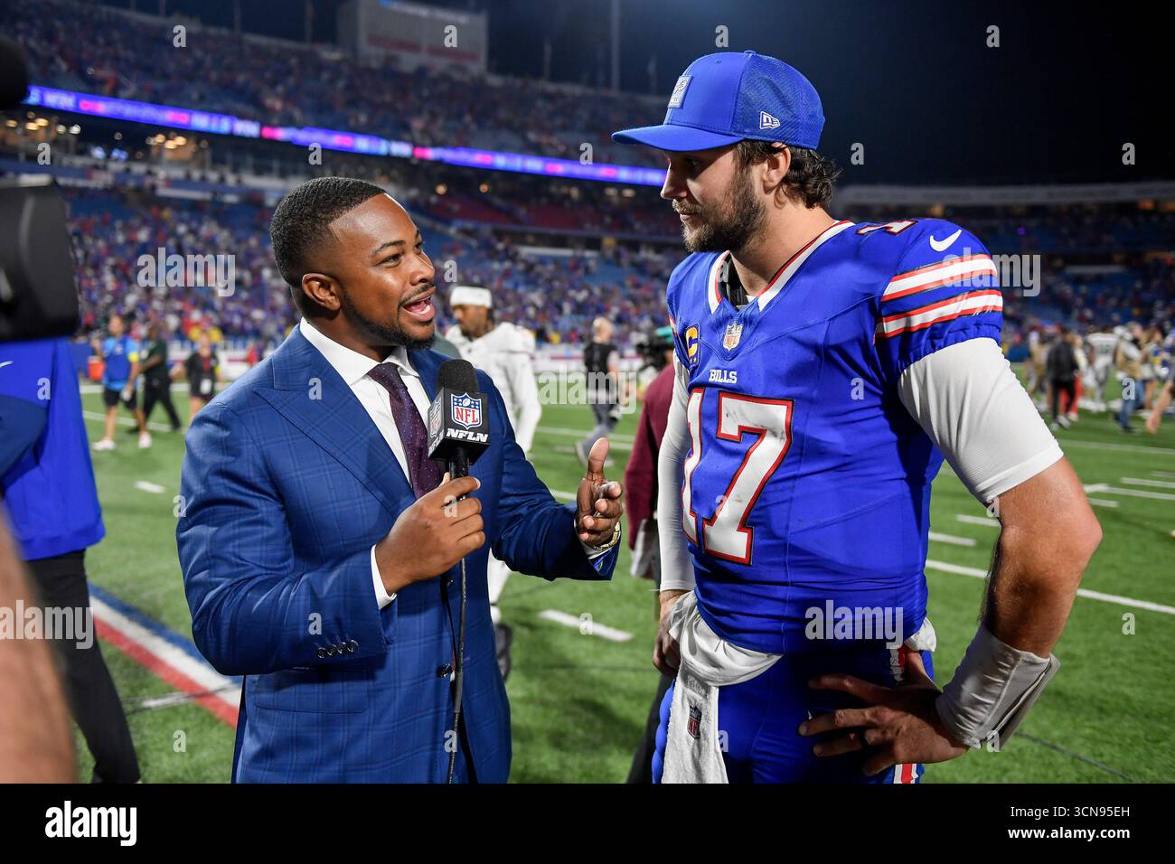 Buffalo Bills quarterback Josh Allen, right, is interviewed by NFL ...