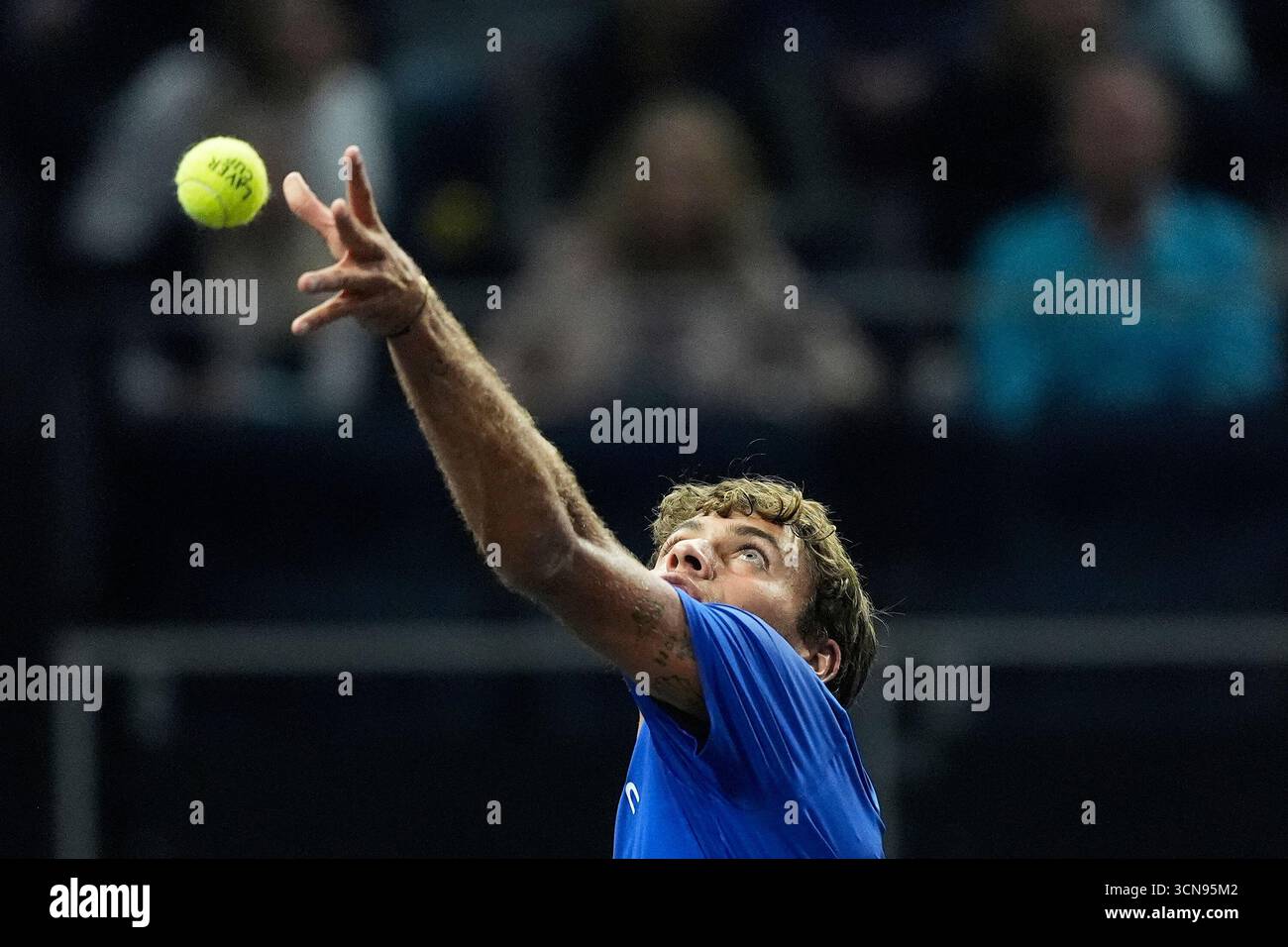 Team Europe's Flavio Cobolli, of Italy, serves against Team World's ...