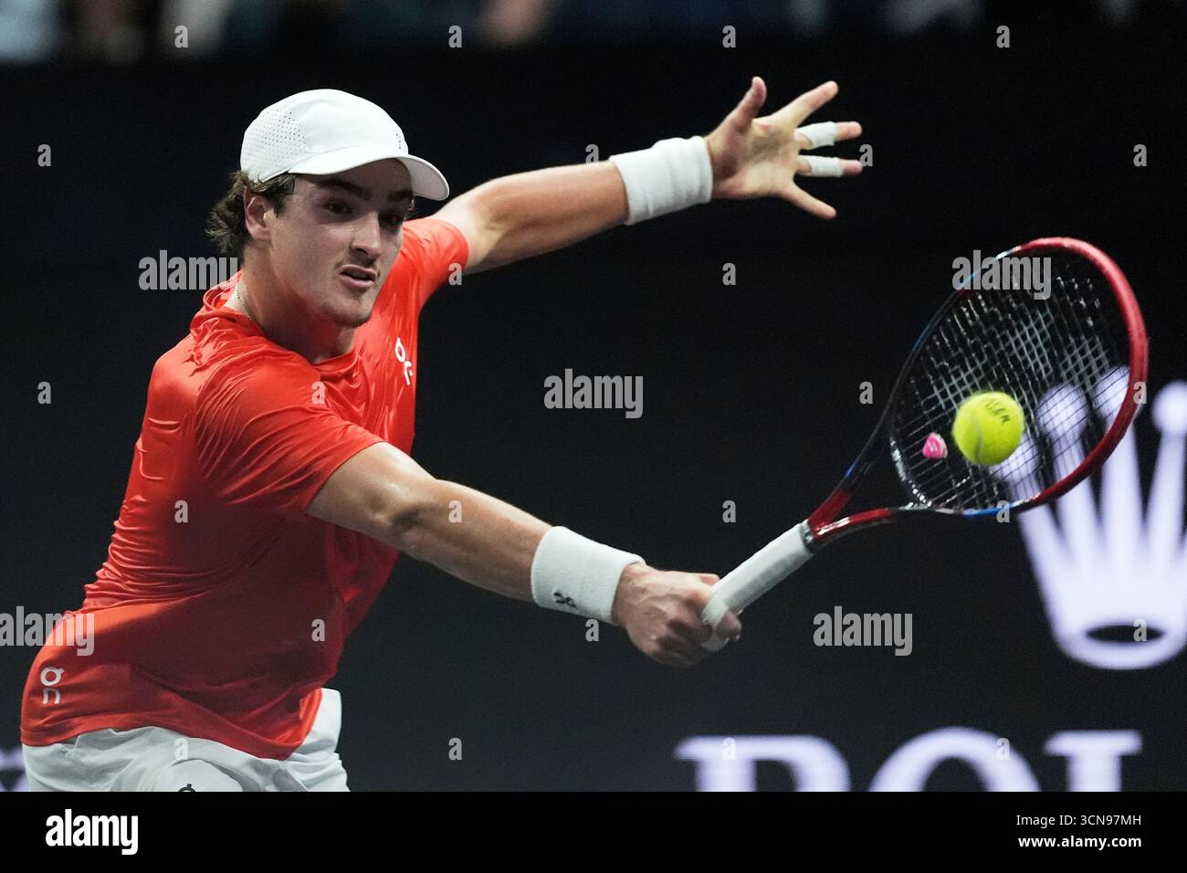 Team World's João Fonseca, of Brazil, returns a shot against Team ...