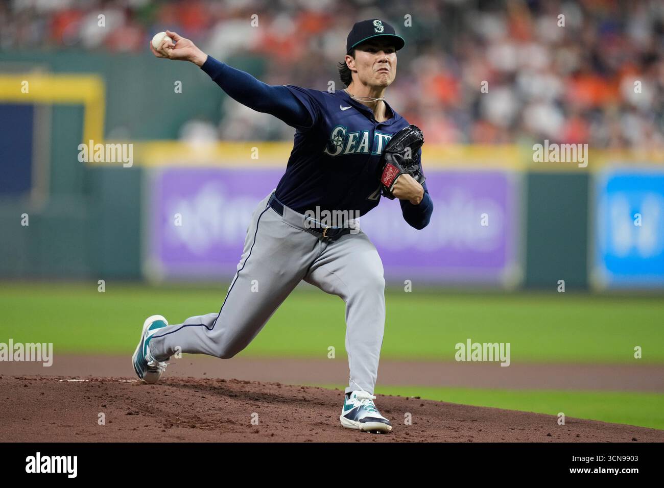 Seattle Mariners pitcher Bryan Woo (22) pitches during the first inning ...